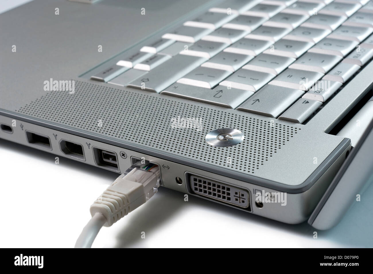 A laptop with an internet wire Stock Photo - Alamy