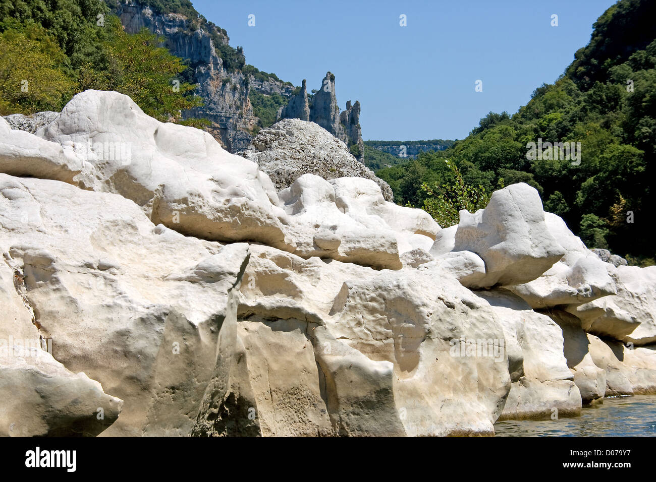 Rocks in the Ardeche of France with view of the famous cathedral in the ...