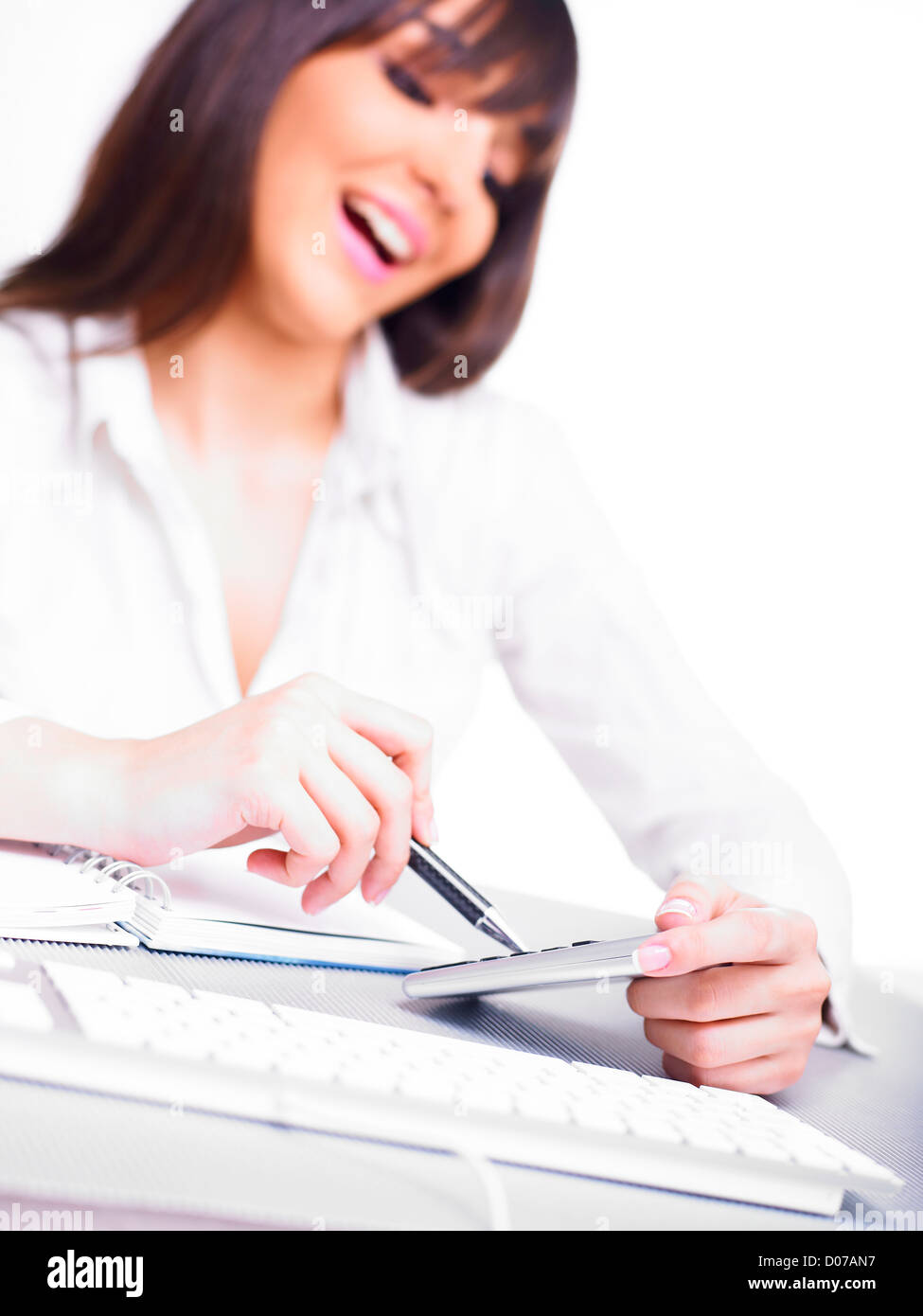 Beautiful bussines woman calculating with calculator and smile Stock ...