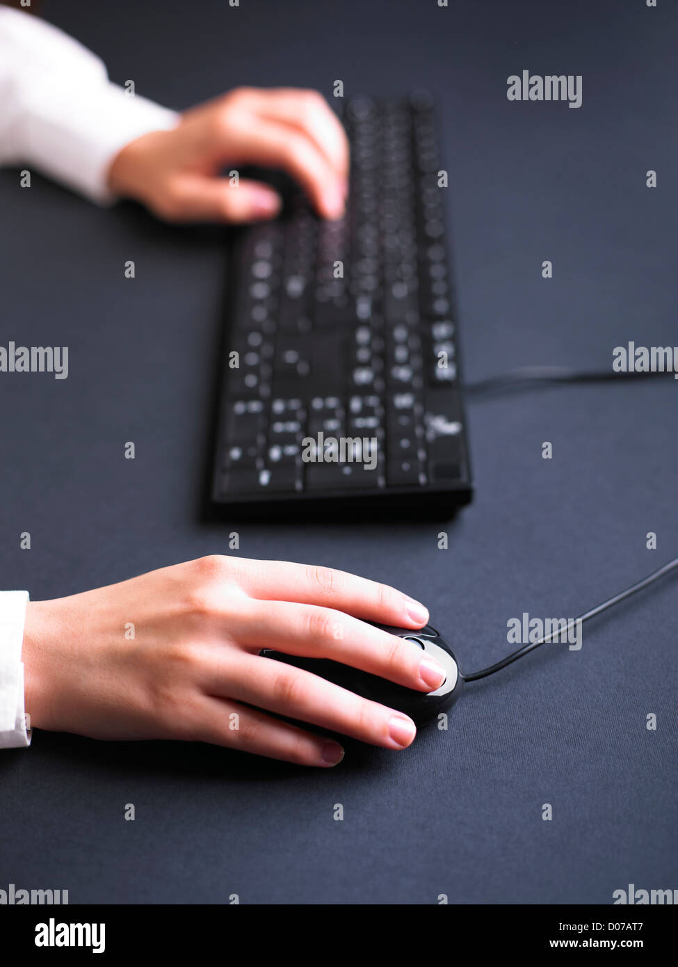 Business Secretary Typing on Computer Keyboard Stock Photo - Alamy