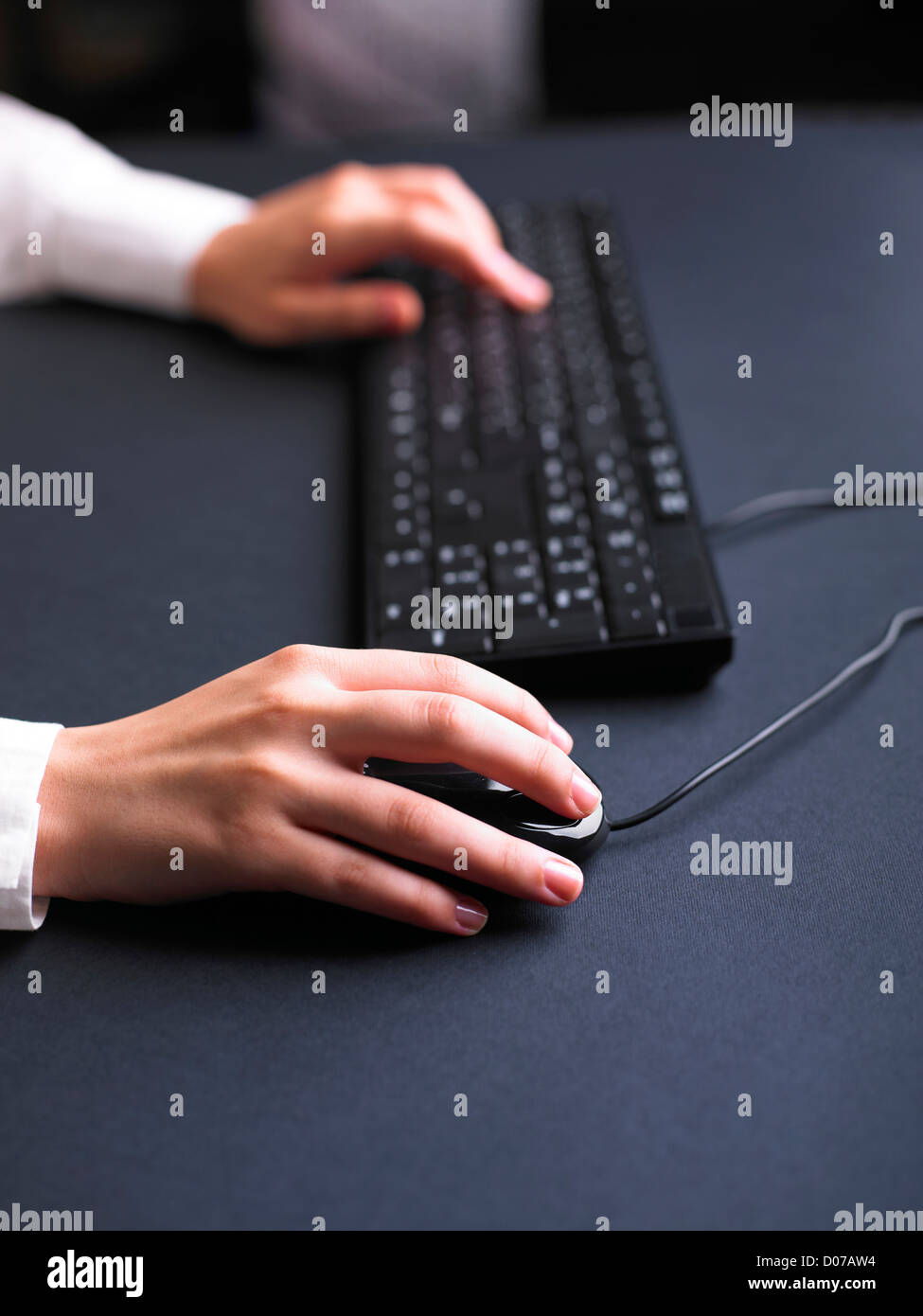 Business Secretary Typing on Computer Keyboard Stock Photo - Alamy