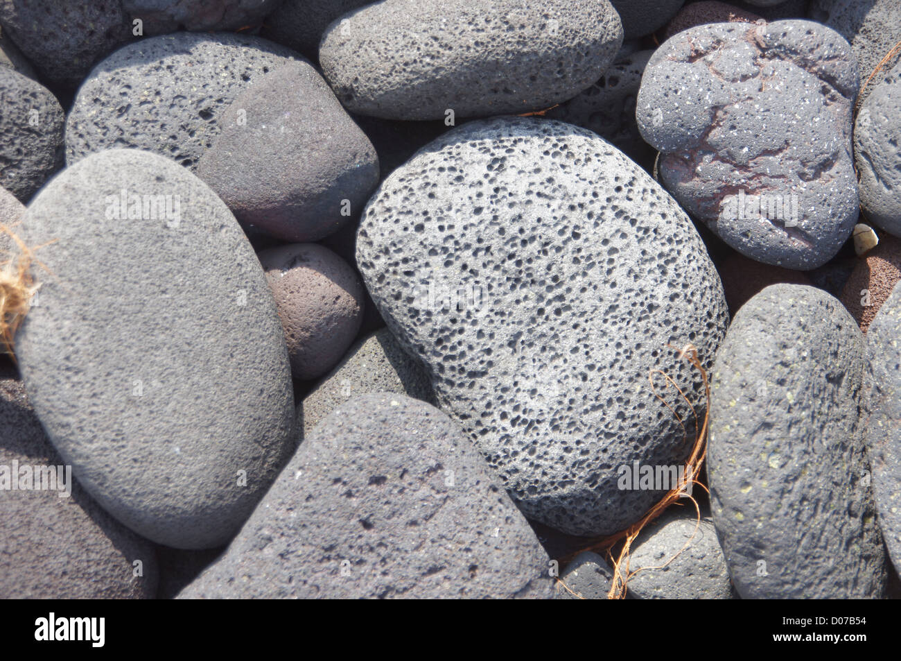 Lava rocks, rounded by the ocean at Napo'opo'o beach in Kealakekua Bay ...