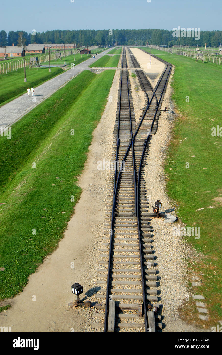 The railroad tracks and platform in Auschwitz Birkenau Stock Photo - Alamy
