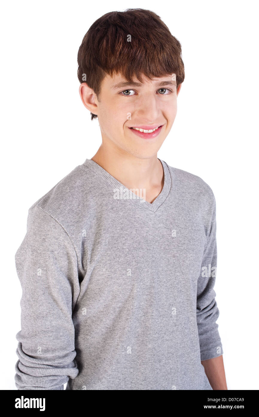 Adorable handsome young boy posing and smiling at camera Stock Photo ...