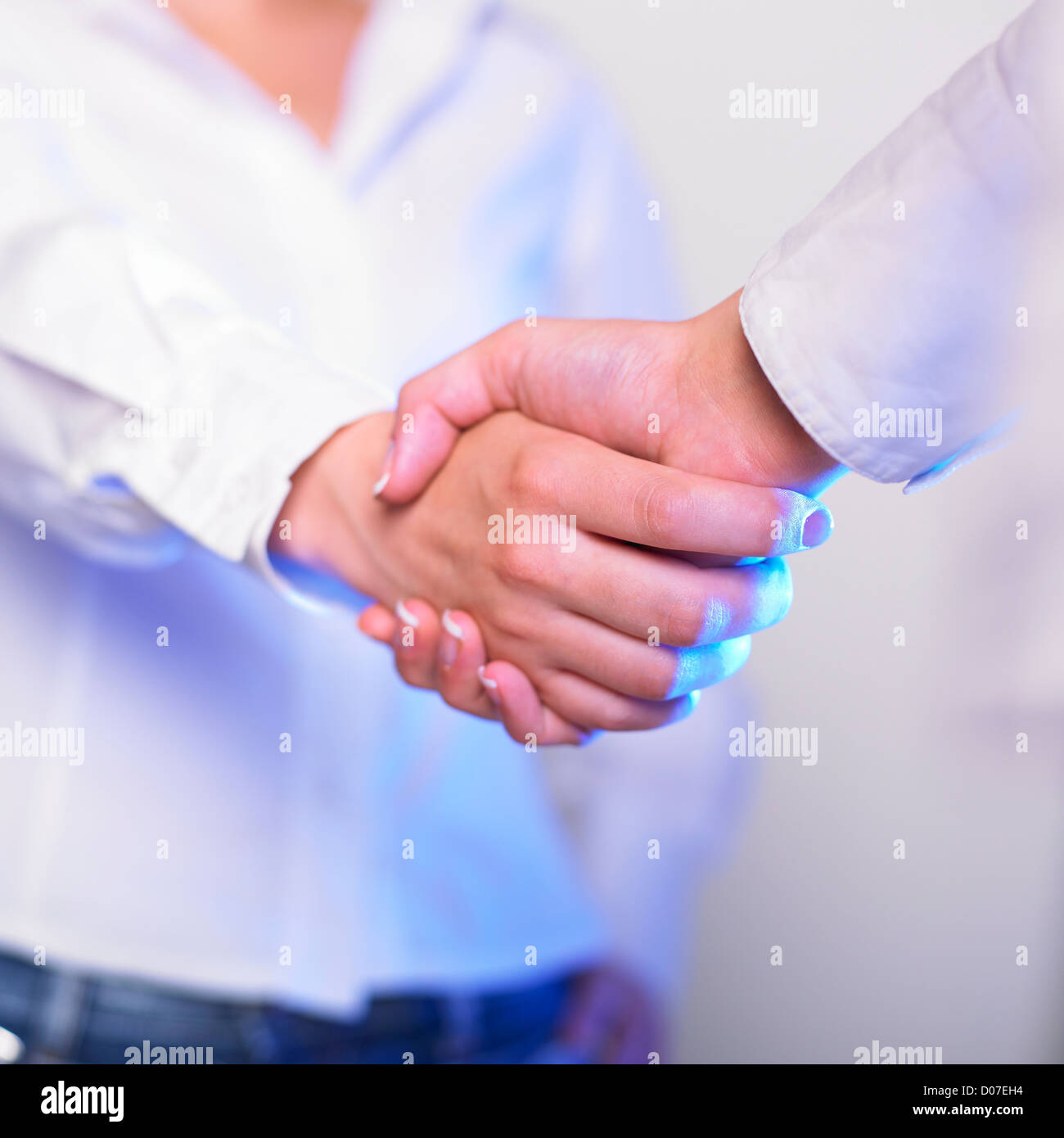Two hands in Handshake - Business Handshaking Stock Photo - Alamy