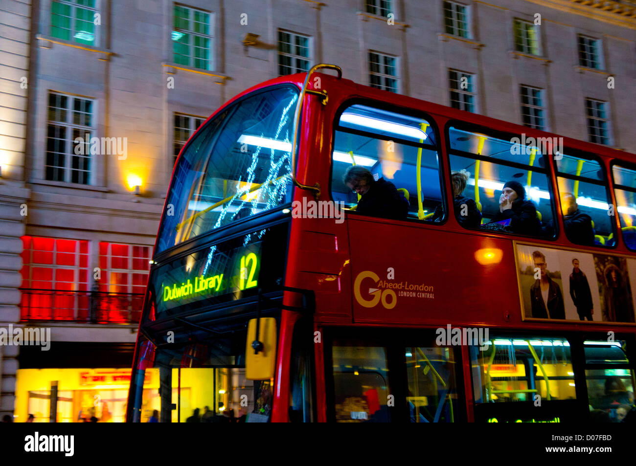 A London bus at night on Regent Street Stock Photo - Alamy