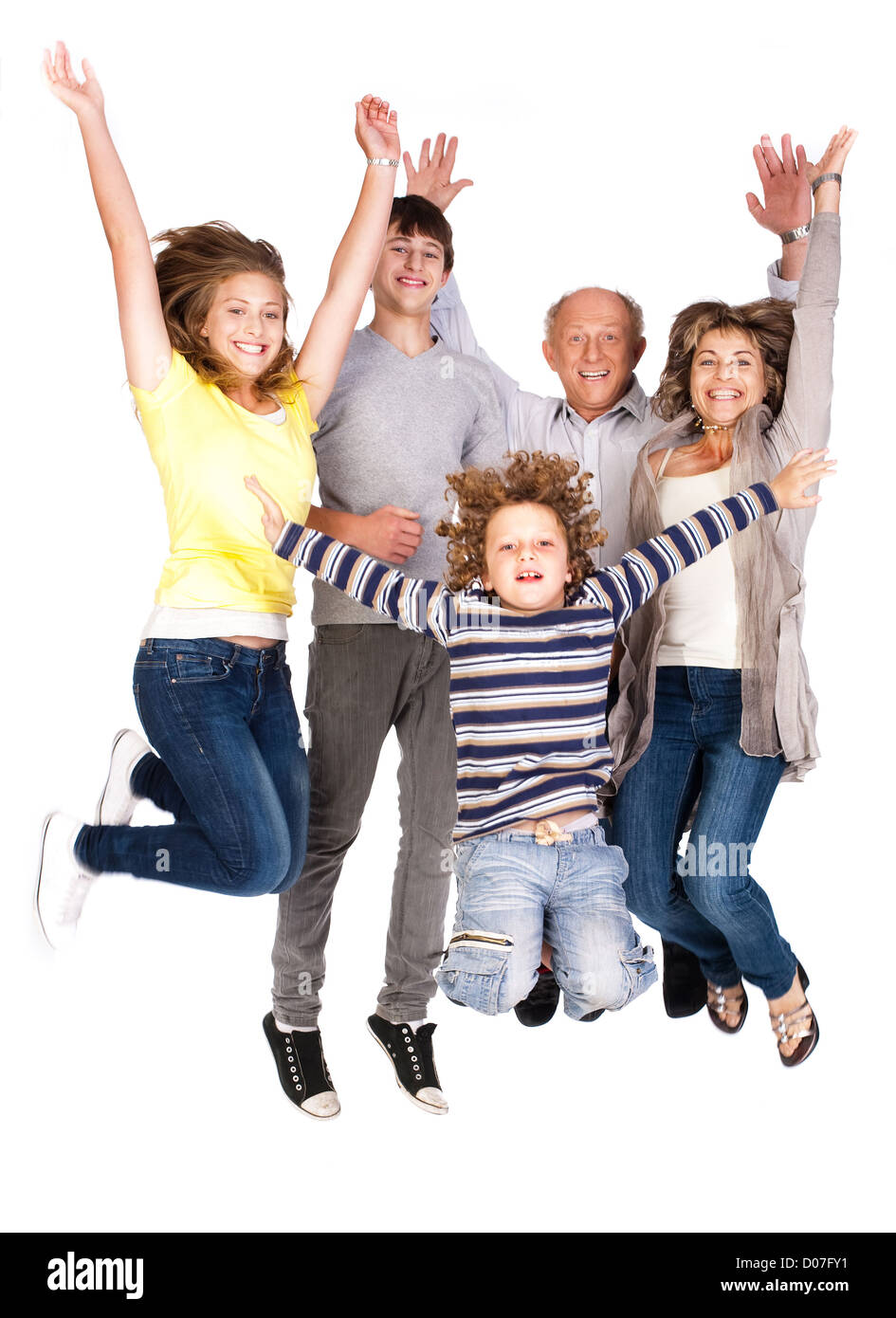 Jumping family having fun, enjoying indoors Stock Photo - Alamy
