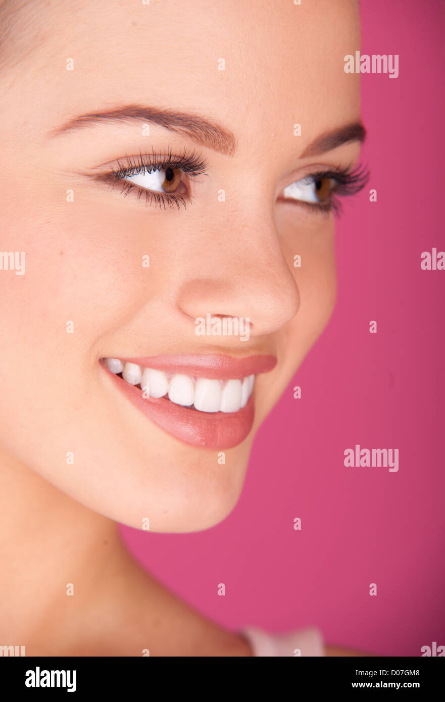 Beautiful young woman. perfect teeth smiling Stock Photo - Alamy