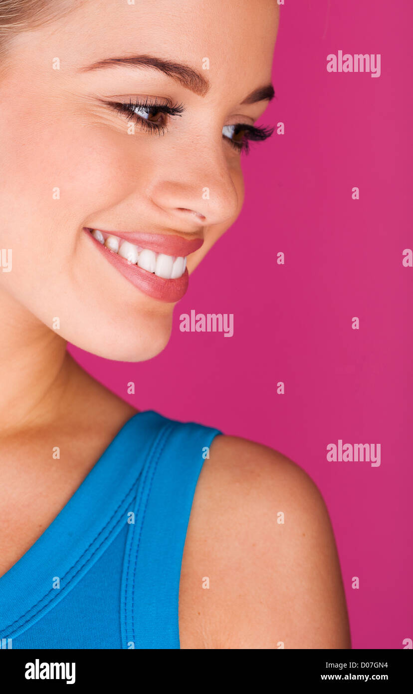 Beautiful young woman. perfect teeth smiling Stock Photo - Alamy