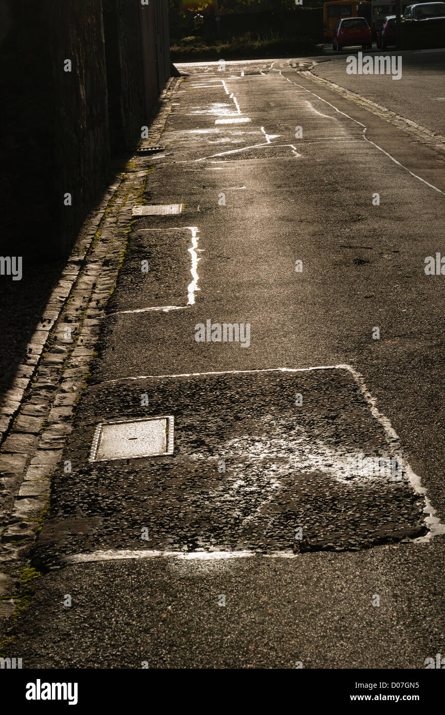 Patched road hi-res stock photography and images - Alamy