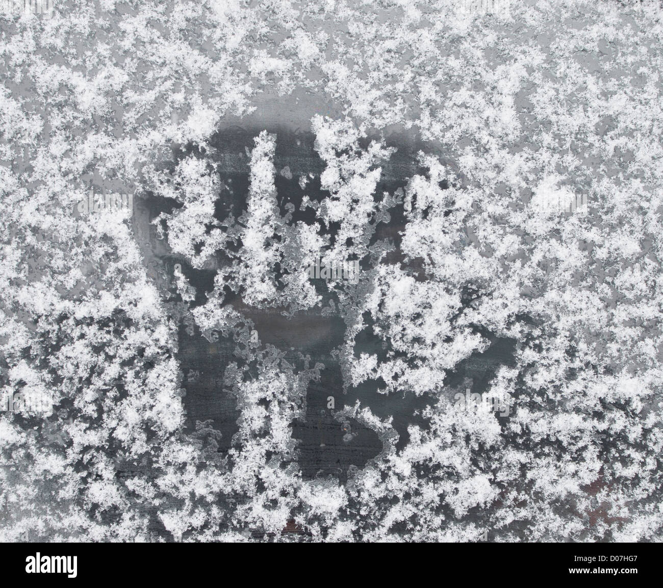 hand trace on the frozen snow glass Stock Photo - Alamy