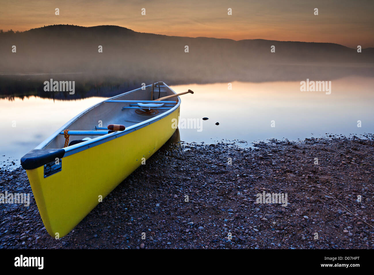Canoe on the shore of Lac Monroe during sunset in Parc national du Mont ...