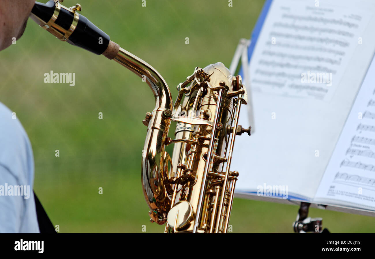 Playing saxophone hi-res stock photography and images - Alamy