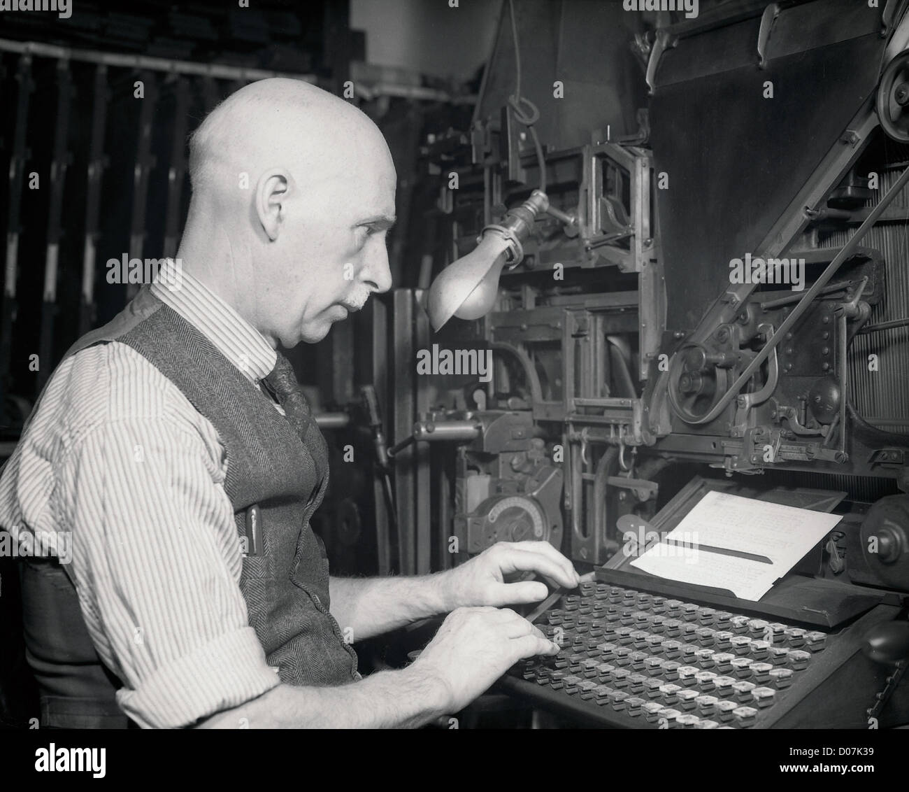 Black and white profile of man typing Stock Photo - Alamy