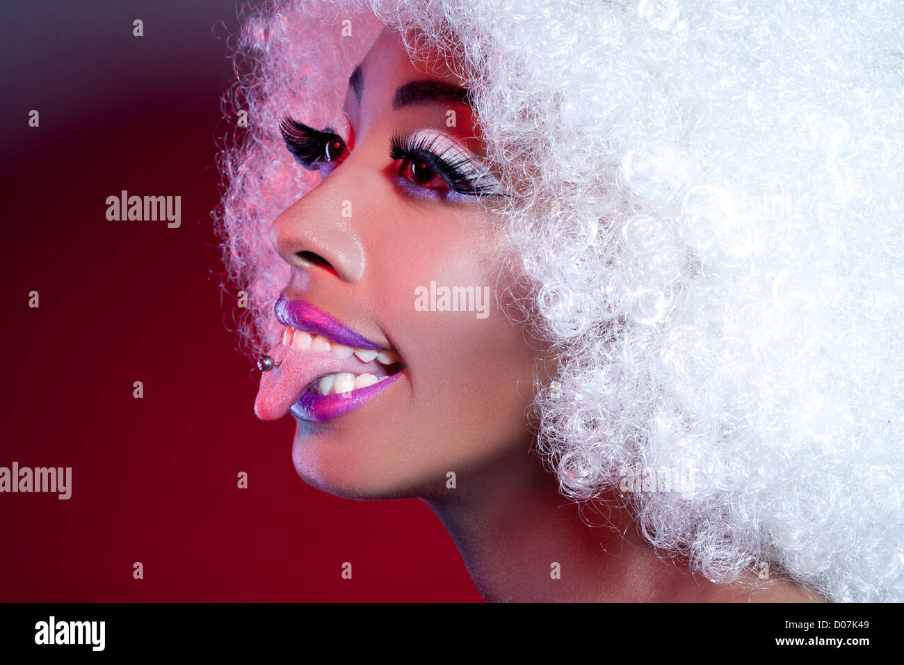african beauty with a creative make-up and afro Stock Photo - Alamy