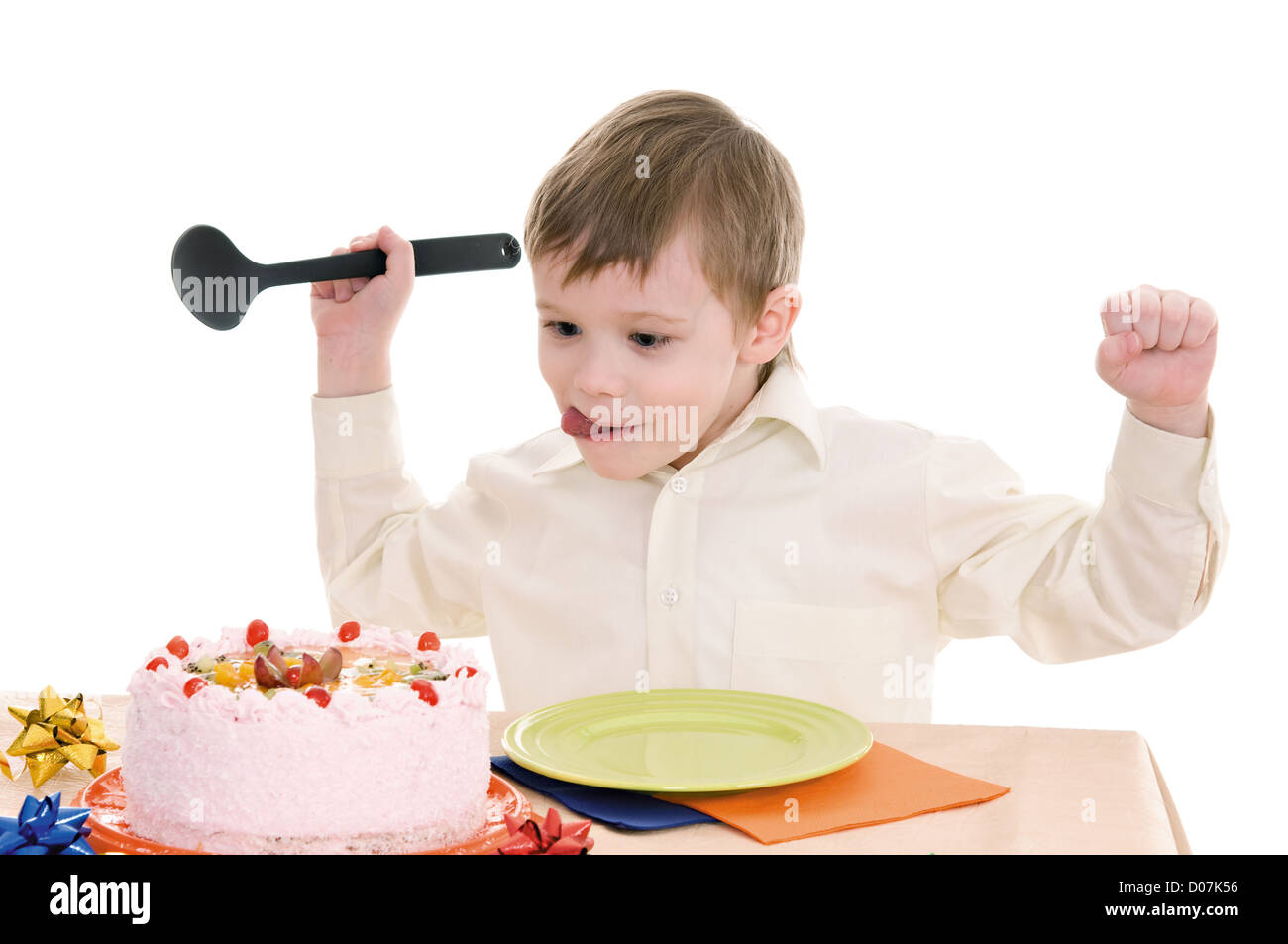 child with a large spoon is going to eat cake isolated on white ...