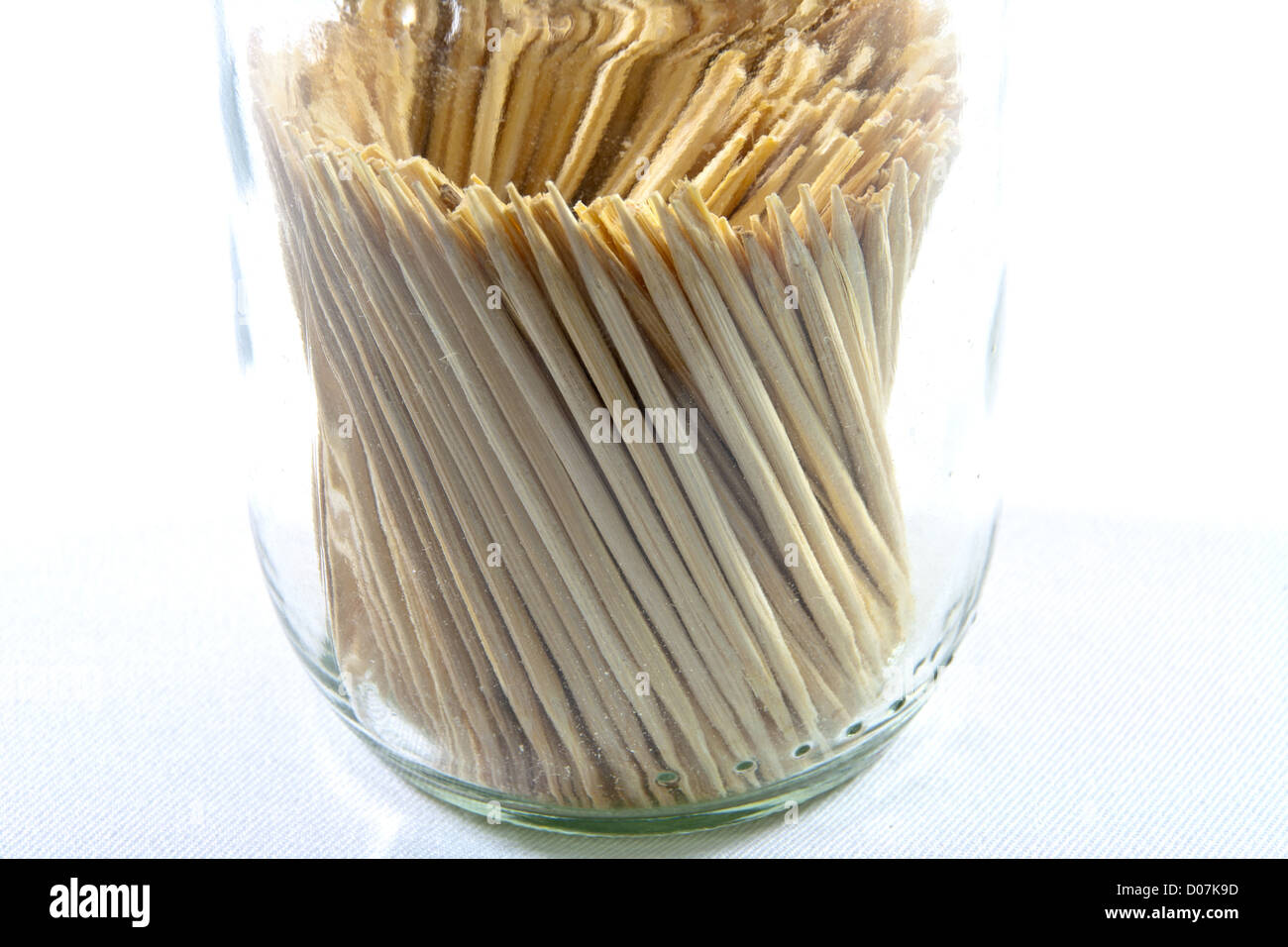 Toothpick in Glass bottles made bamboo on white background Stock Photo ...