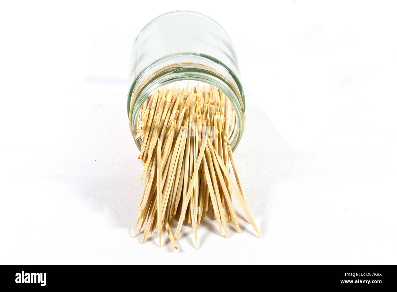 Toothpick in Glass bottles made bamboo on white background Stock Photo ...