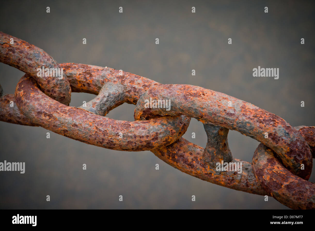 Rusty chains linked together Stock Photo - Alamy