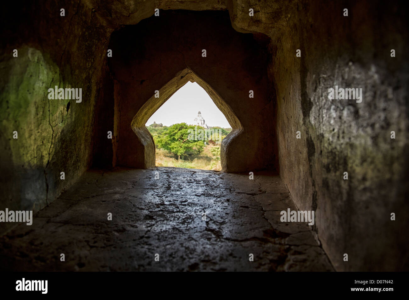 Looking through a decorative temple portal onto Bagan Myanmar (Burma ...