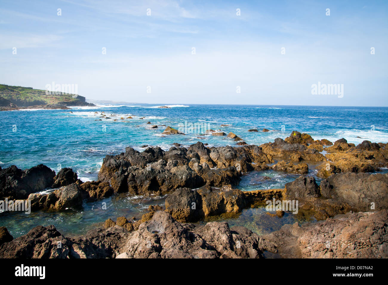 Rocks in the foreground and the beautiful horizon in the background in ...