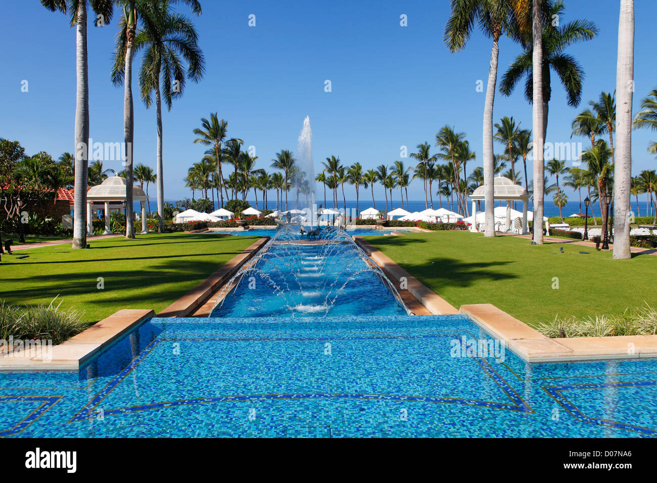 Main swimming pool alley in Grand Wailea resort Stock Photo - Alamy