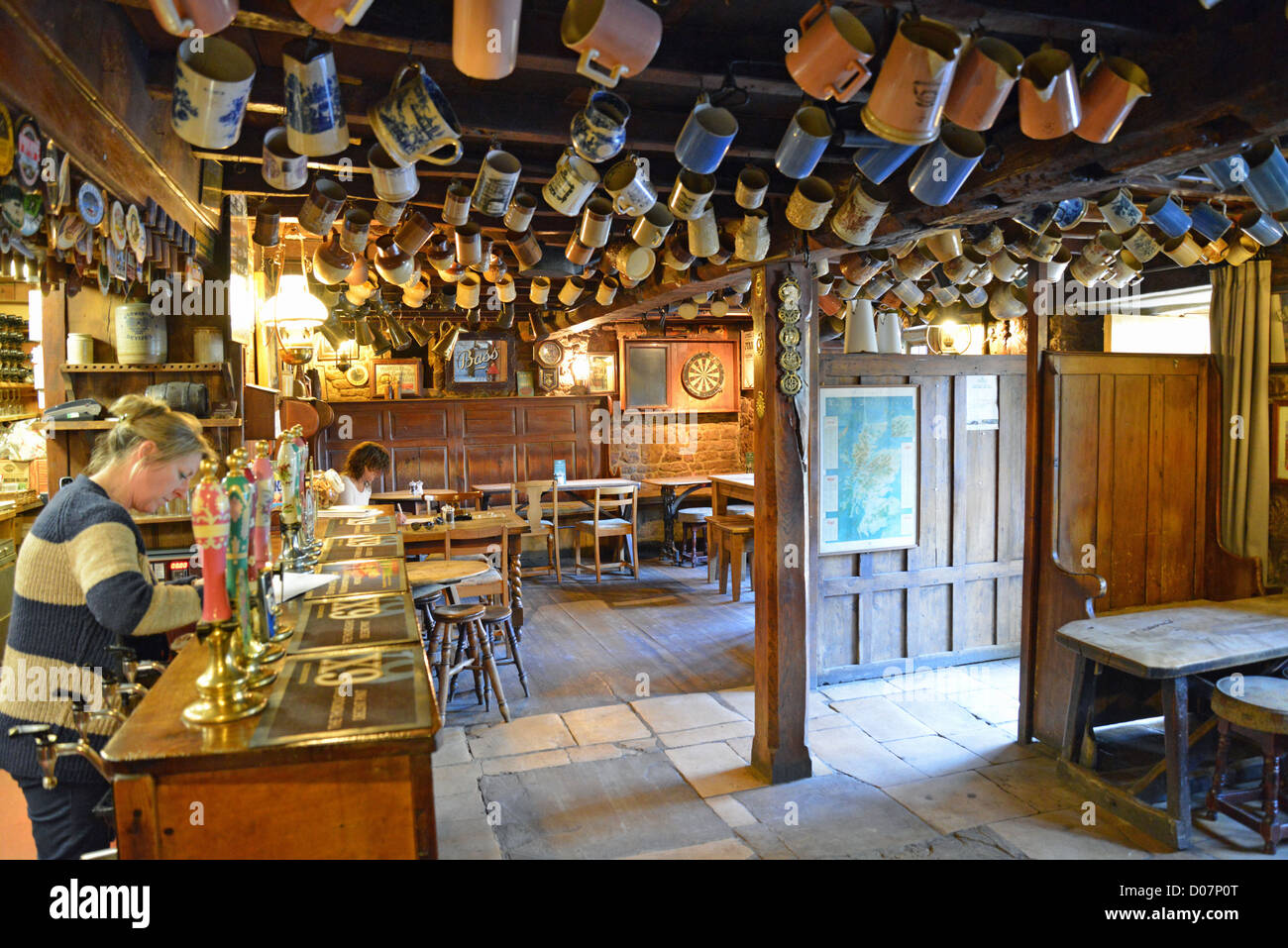16th Century bar in The Falkland Arms, Great Tew, Oxfordshire, England ...