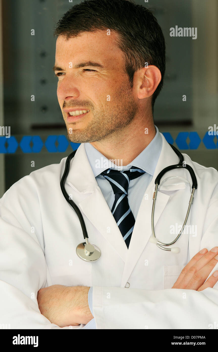 portrait of doctor in front an entrance of the hospital Stock Photo - Alamy