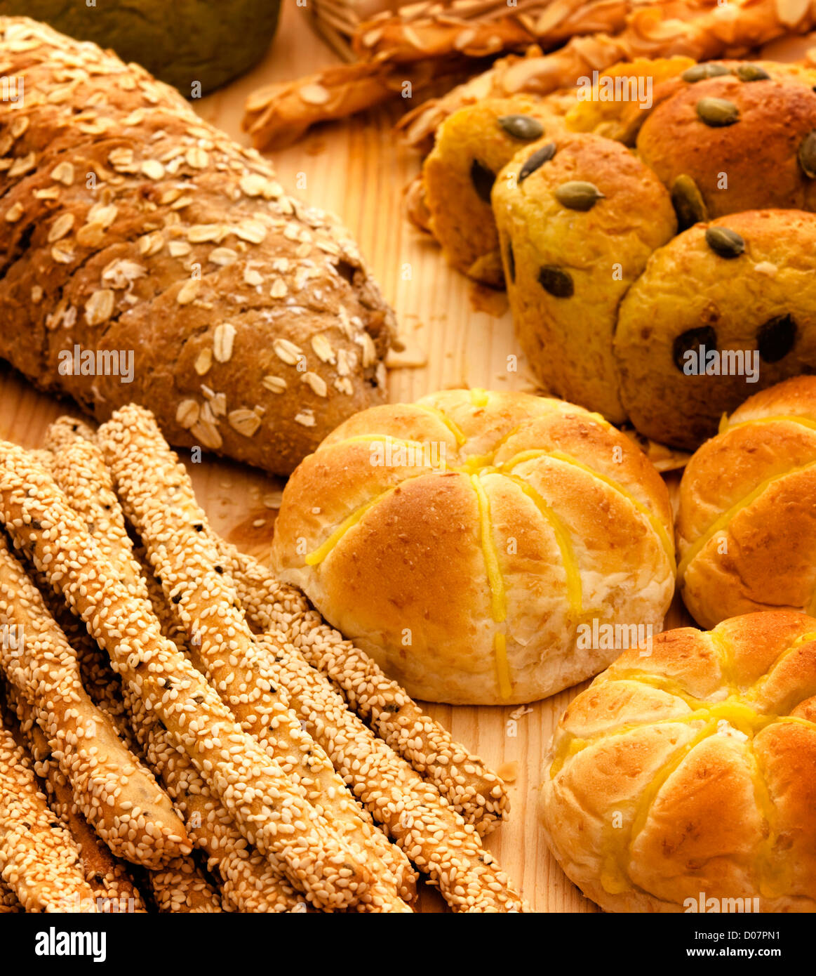 Variety of Organic Breads on plank background Stock Photo - Alamy