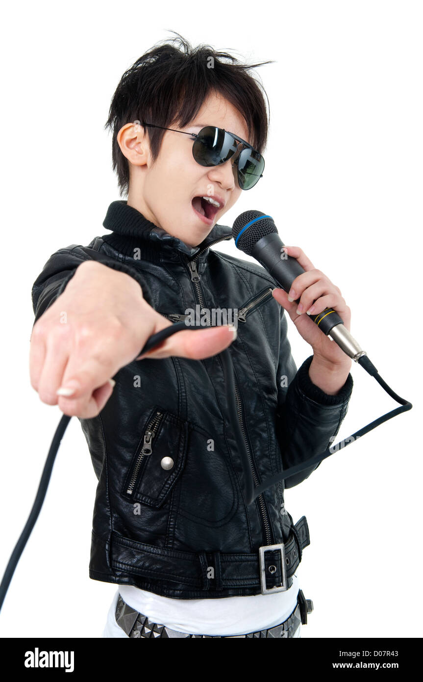Asian rock singer in performance, isolated on white Stock Photo - Alamy