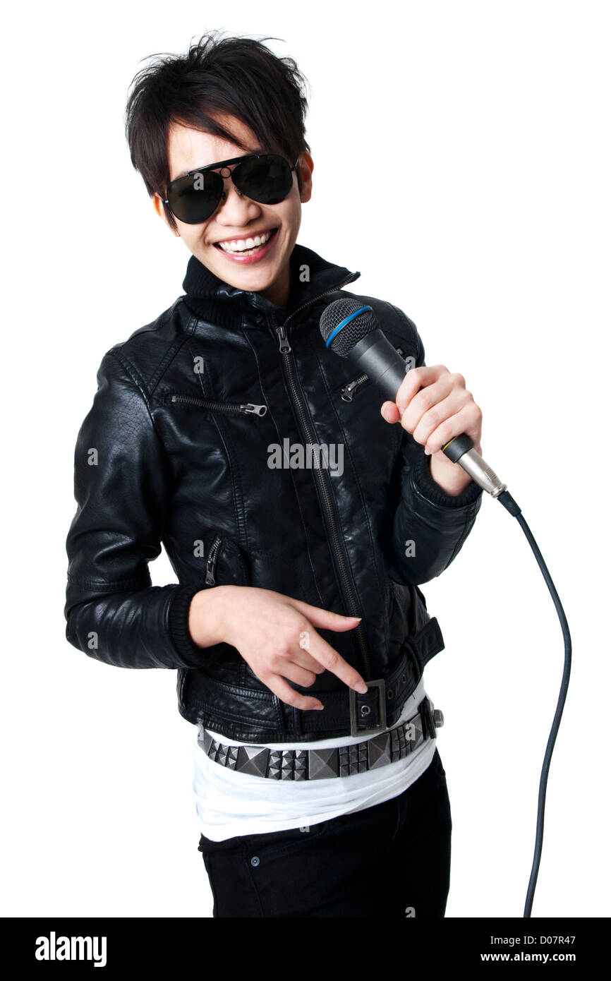Asian rock singer in performance, isolated on white Stock Photo - Alamy