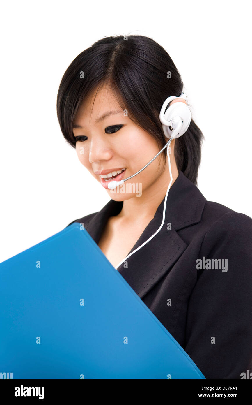 Friendly Customer Representative with headset smiling during a ...