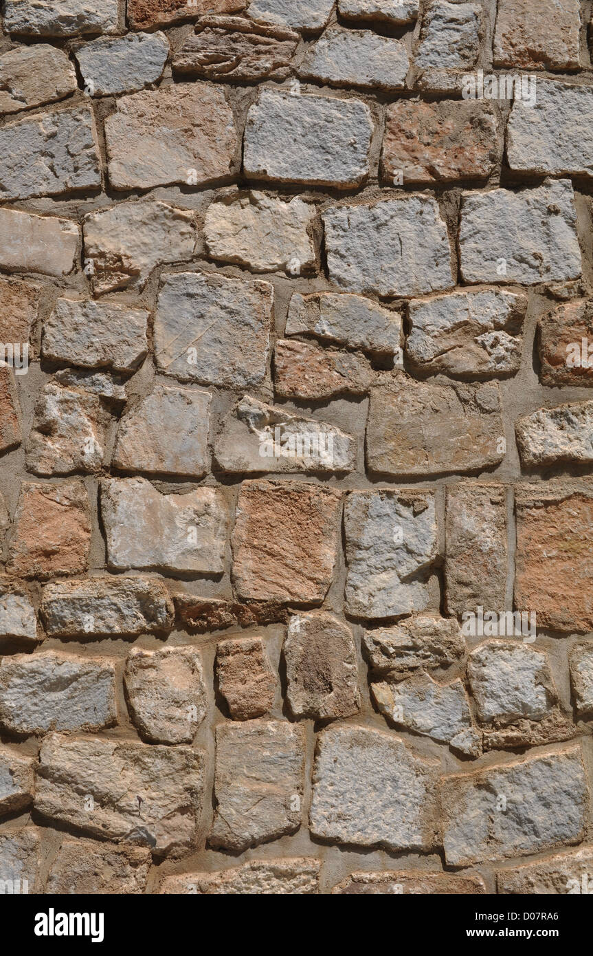 Old Tan Stone Background with mixed size stone Stock Photo - Alamy