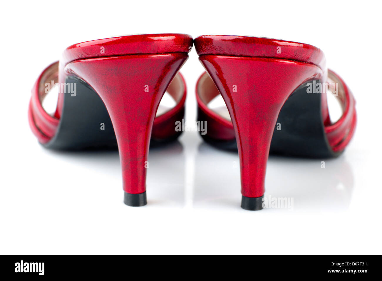Pairs of woman high heels at rear view, on white background Stock Photo ...