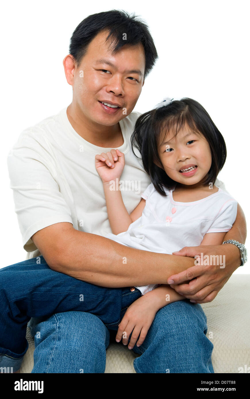 Asian father and daughter on white background Stock Photo - Alamy