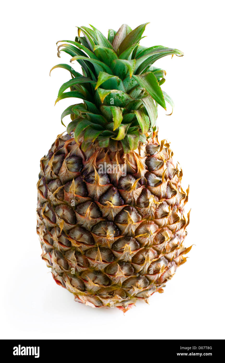 A whole Pineapple isolated on white background Stock Photo - Alamy