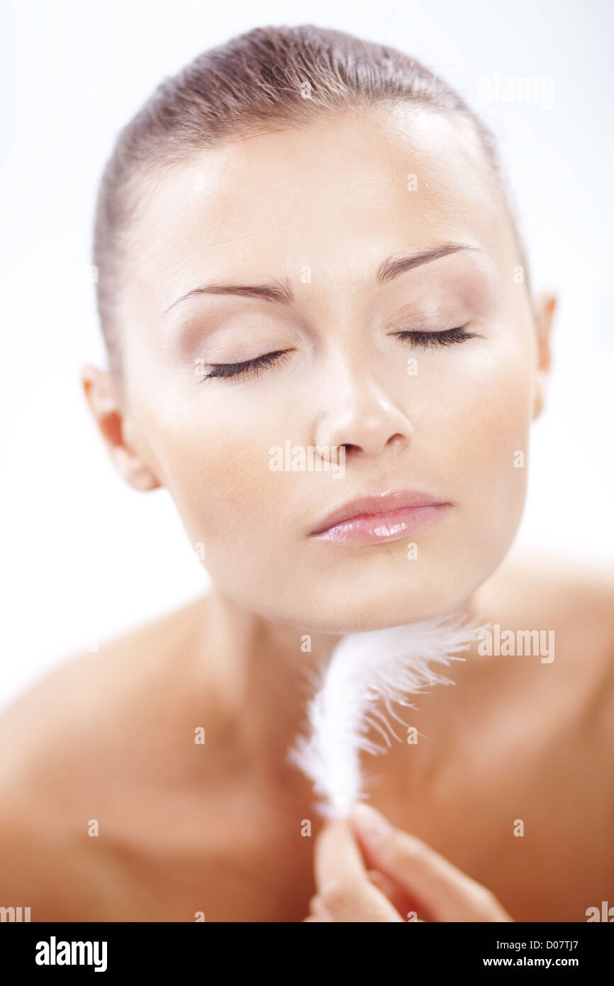 Beautiful female with clean healthy skin closeup over white Stock Photo ...