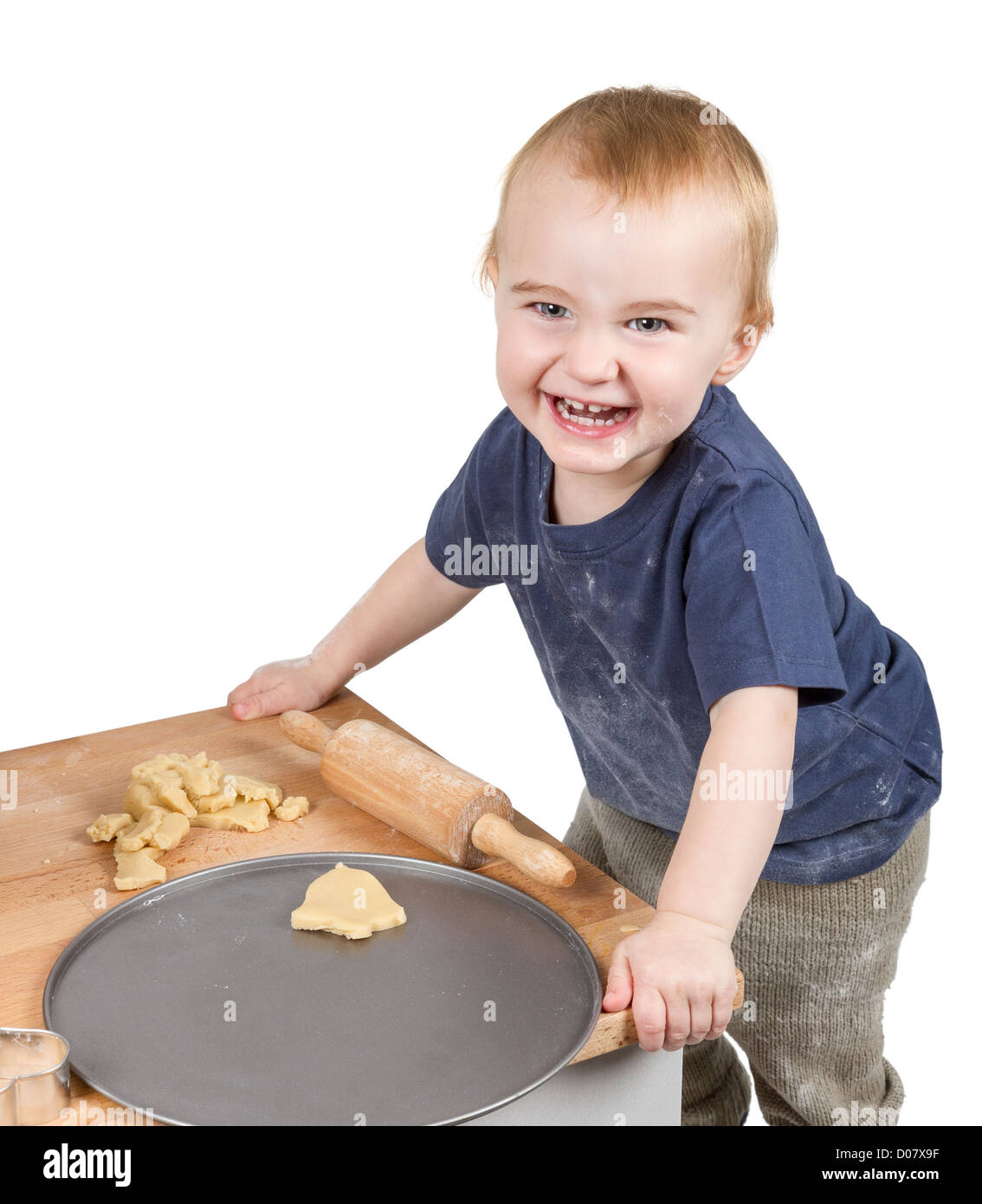 young child making cookies on small wooden desk Stock Photo - Alamy