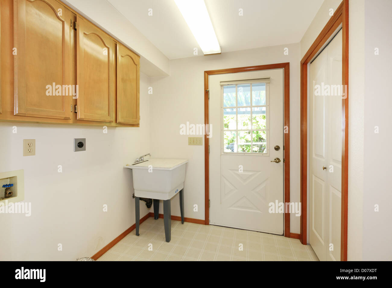 Simple white living room interior Stock Photo - Alamy