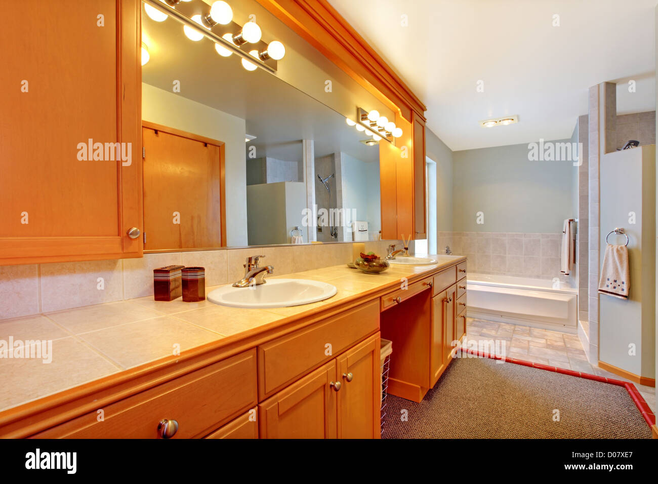 Nice large bathroom with simple classic design Stock Photo - Alamy