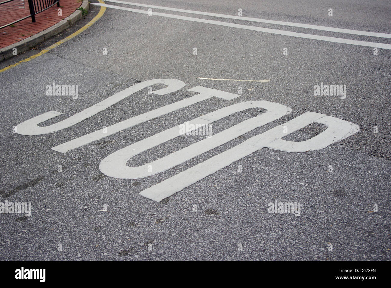 Stop sign on the ground Stock Photo - Alamy