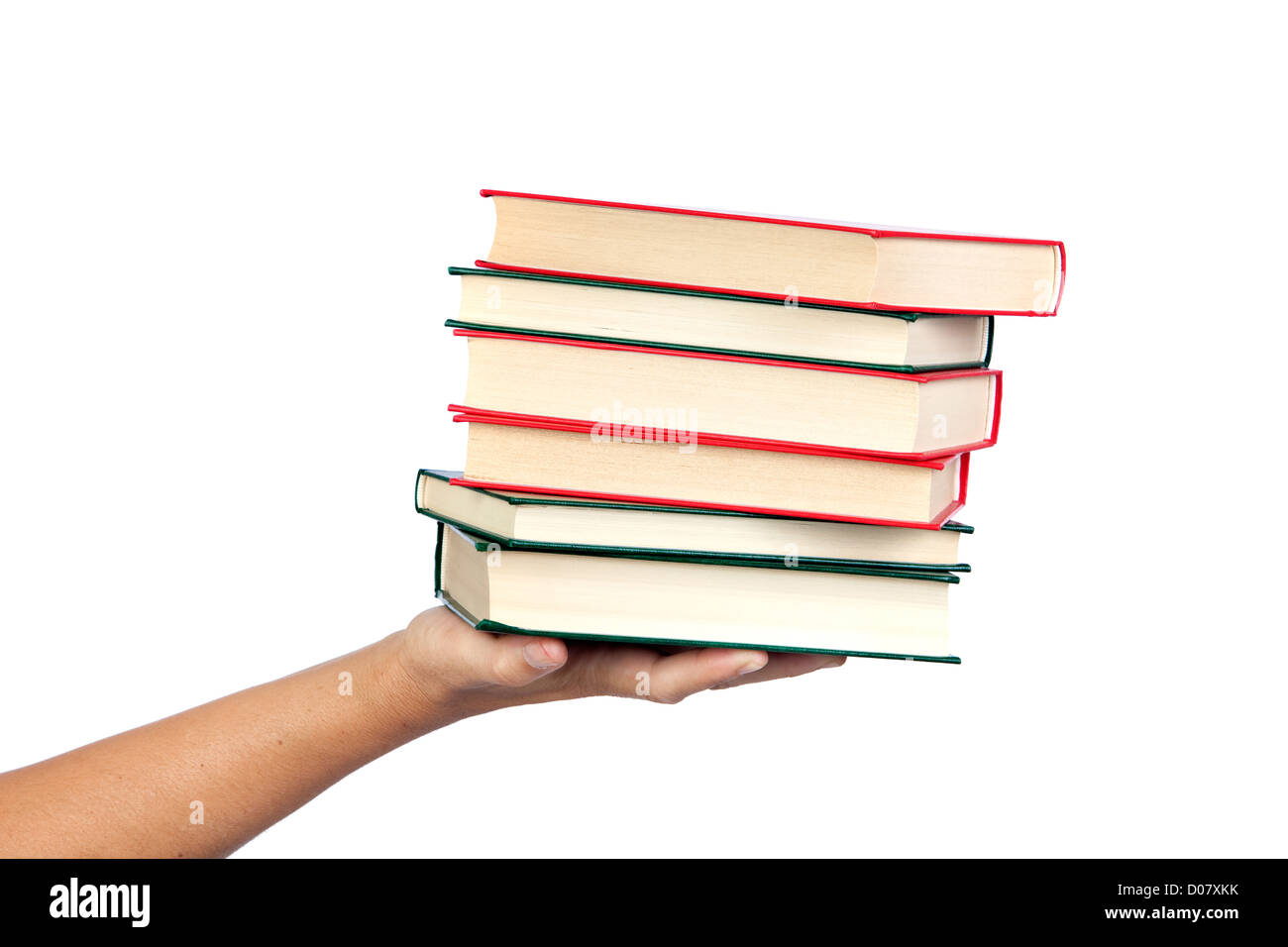 Hand offering many books isolated on white background Stock Photo - Alamy