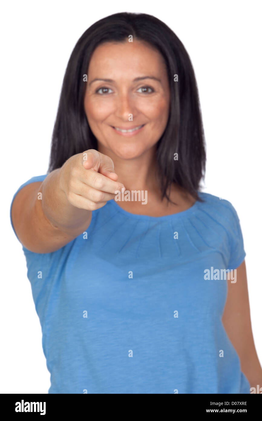 Adorable woman pointing to the front with focus on her index finger ...