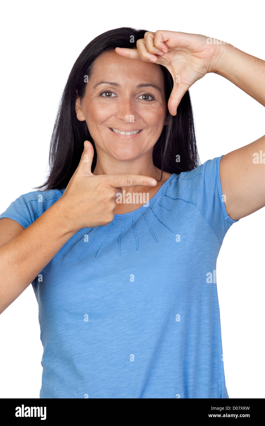 Woman making the gesture of focus the face isolated on white background ...