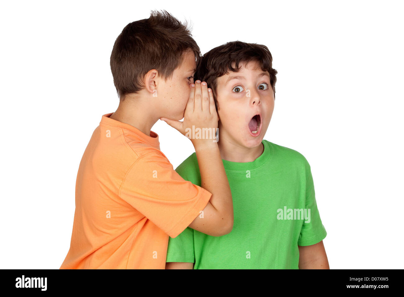 Two children told gossip isolated on white background Stock Photo - Alamy