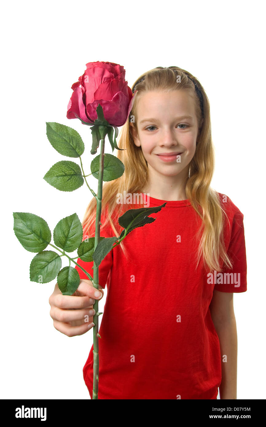 Young blonde girl with silk red rose over white background Stock Photo ...