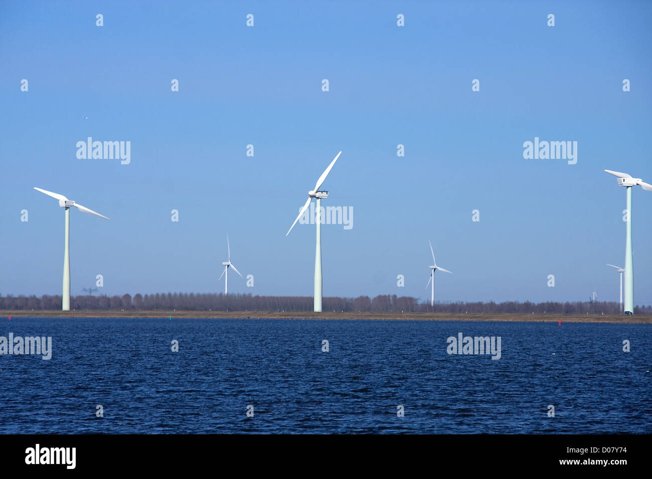 couple of energy wind mills in the Netherlands Stock Photo - Alamy