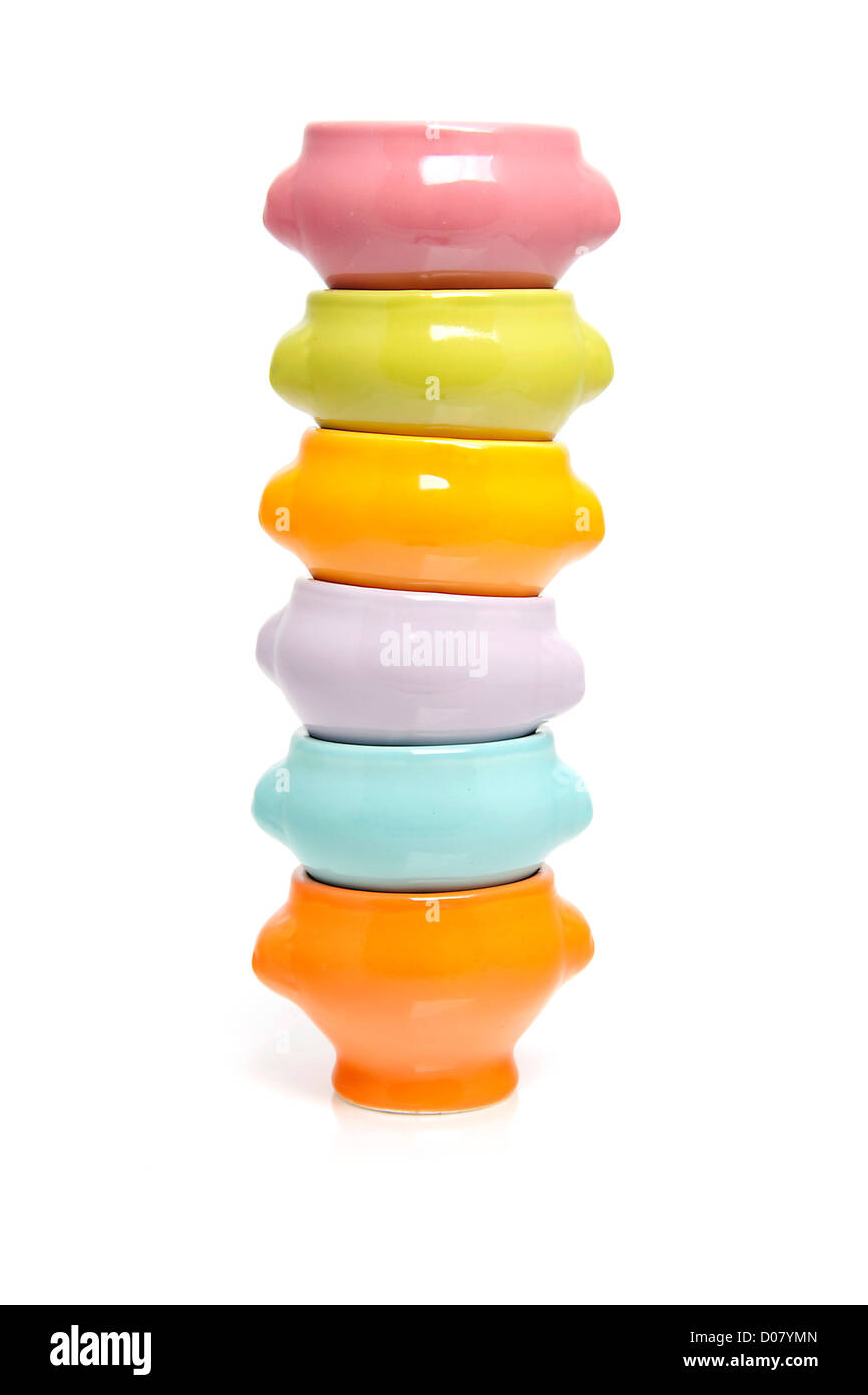 stack of colorful bowls isolated on white background Stock Photo - Alamy