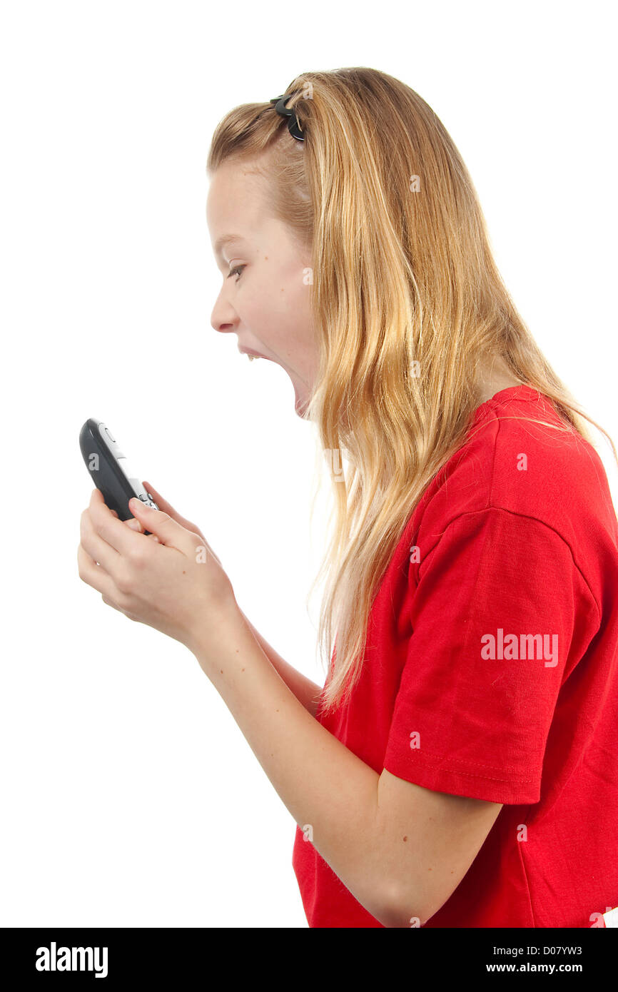 Girl is angry on the phone over white background Stock Photo - Alamy