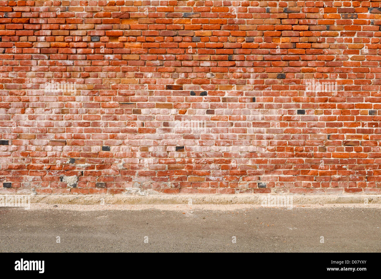 Old Brick Wall and Road Street Stock Photo - Alamy